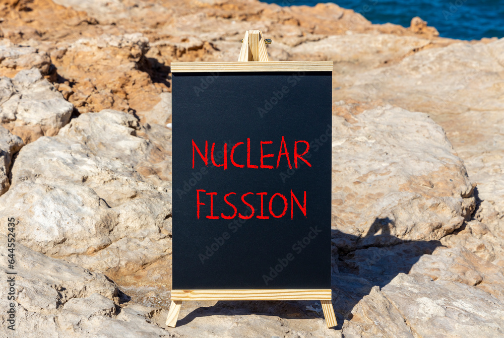 Nuclear fission symbol. Concept words Nuclear fission on beautiful ...