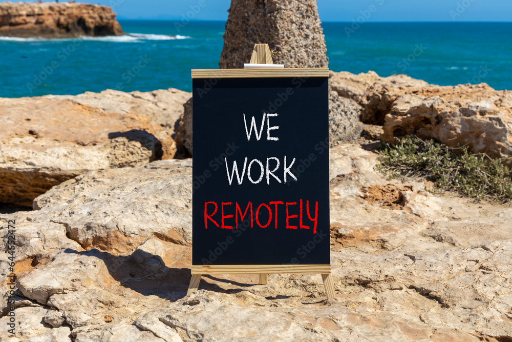 We work remotely symbol. Concept words We work remotely on beautiful ...