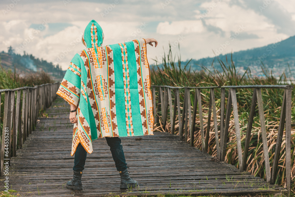 Model wearing a poncho handmade with sheep cloth by the indigenous ...