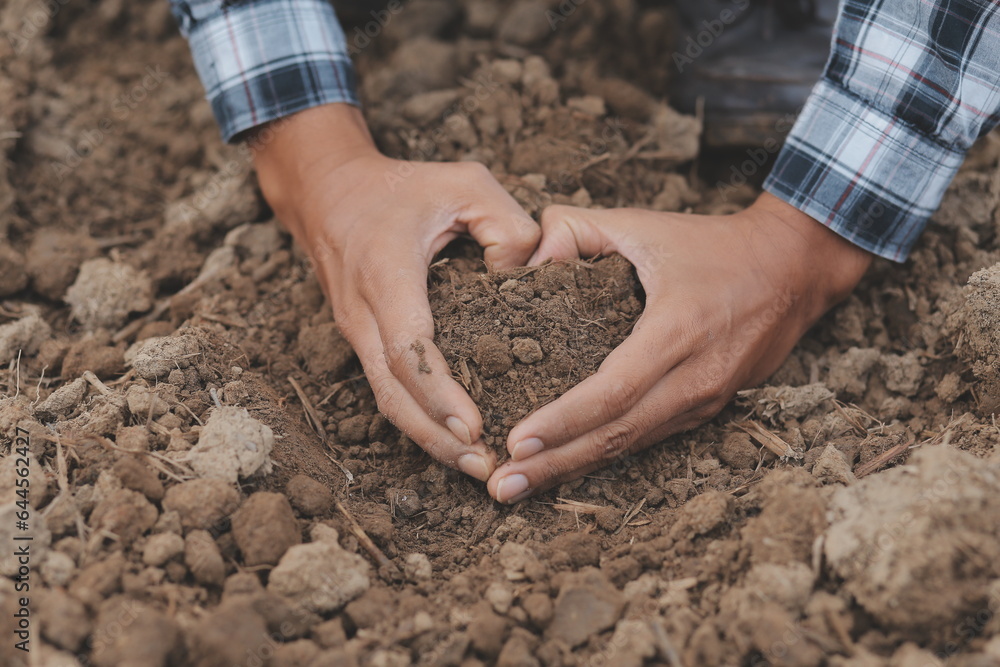 Symbol heart earth day. Handful of dirt hands heart shape. Farm organic ...