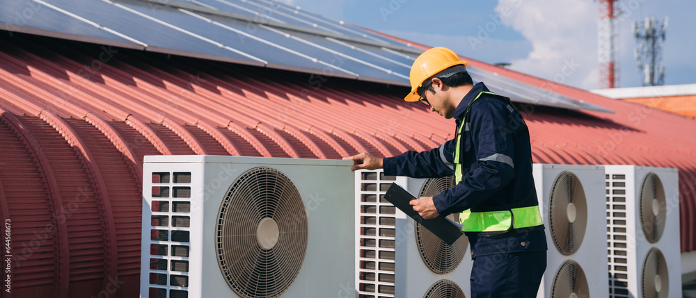 Engineers is checking the air conditioning cooling system of a major ...