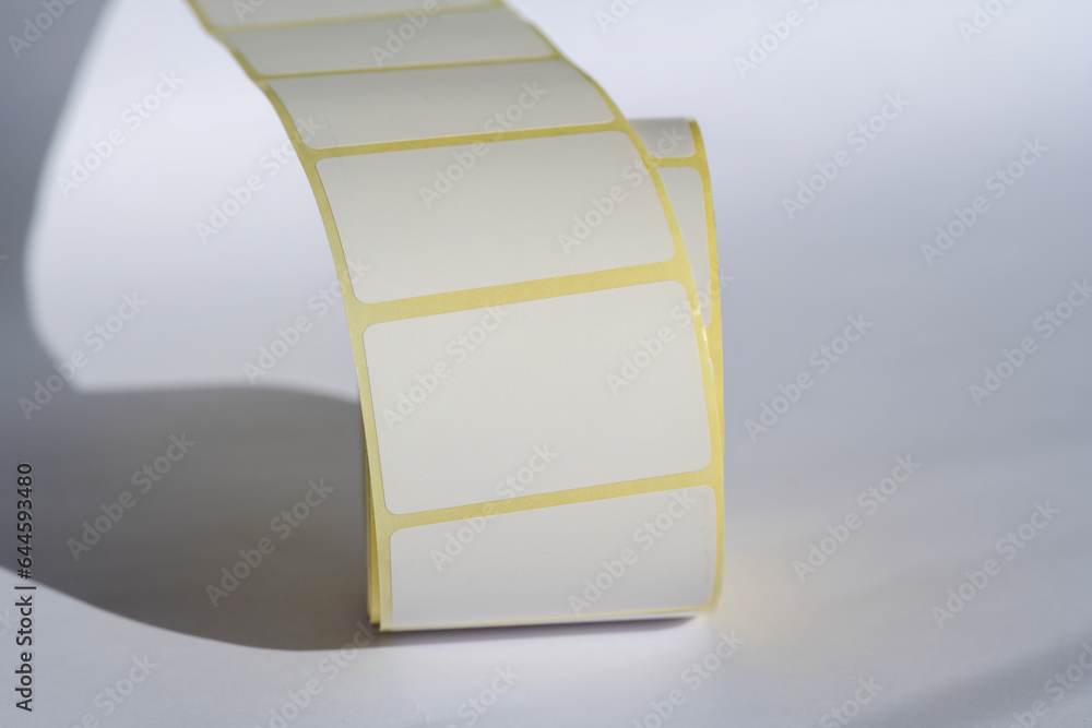 Rolls of white labels isolated. Labels for direct thermal or thermal ...