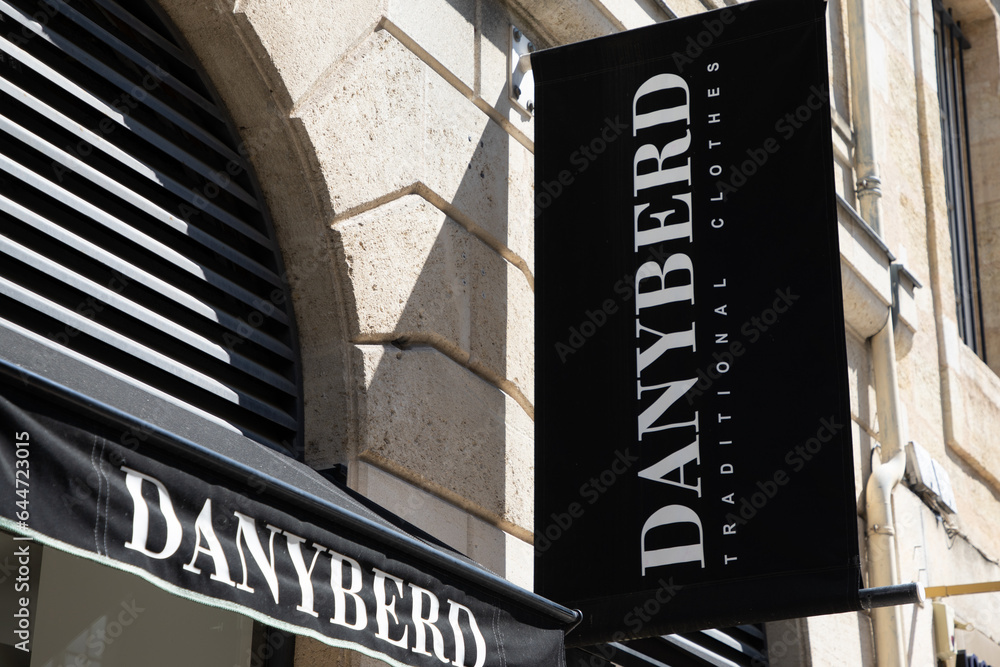 danyberd traditional clothes facade shop logo brand and text sign store ...