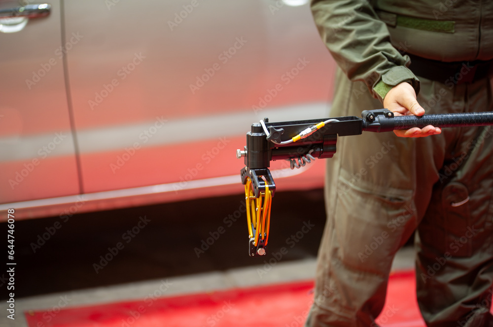 Remote controlled mechanical arm Used for inspecting objects suspected ...