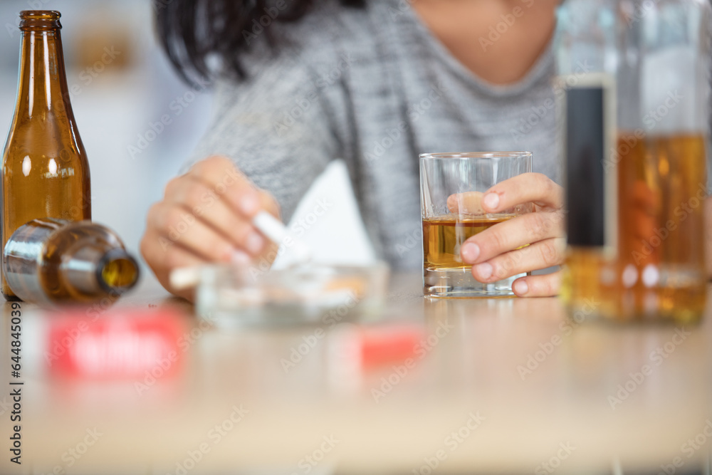 woman hands holding a cigarette and drinking alcohol Stock Photo ...