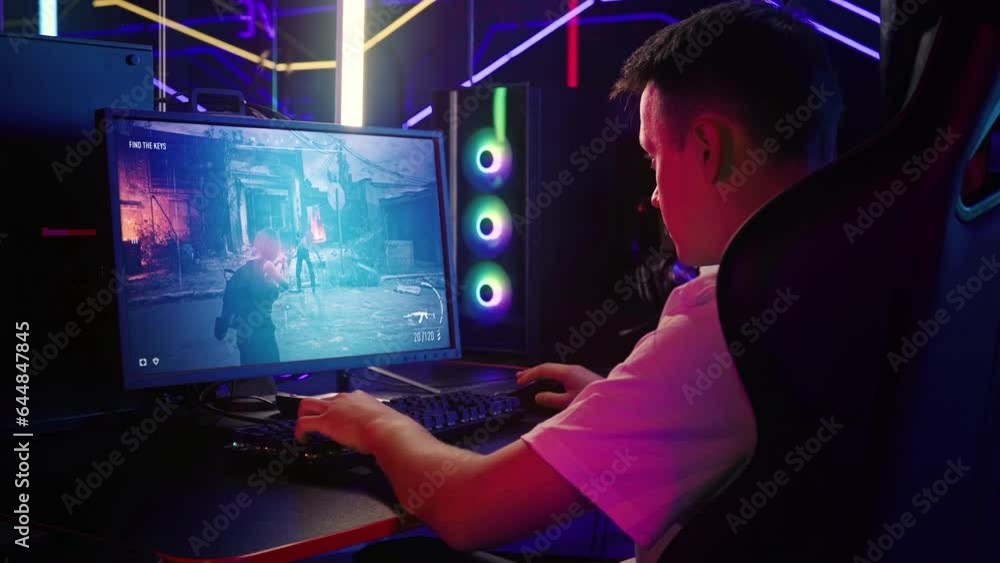 Gamer playing the mockup fake video game on the pc. Gamer destroying ...
