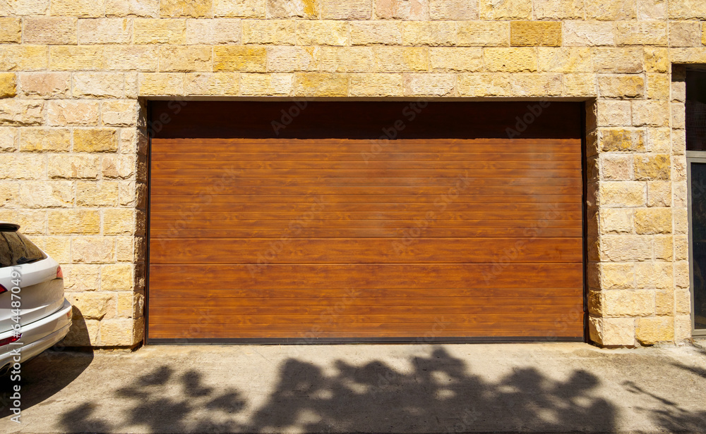 automated garage gates as a background, entrance to the parking lot and ...