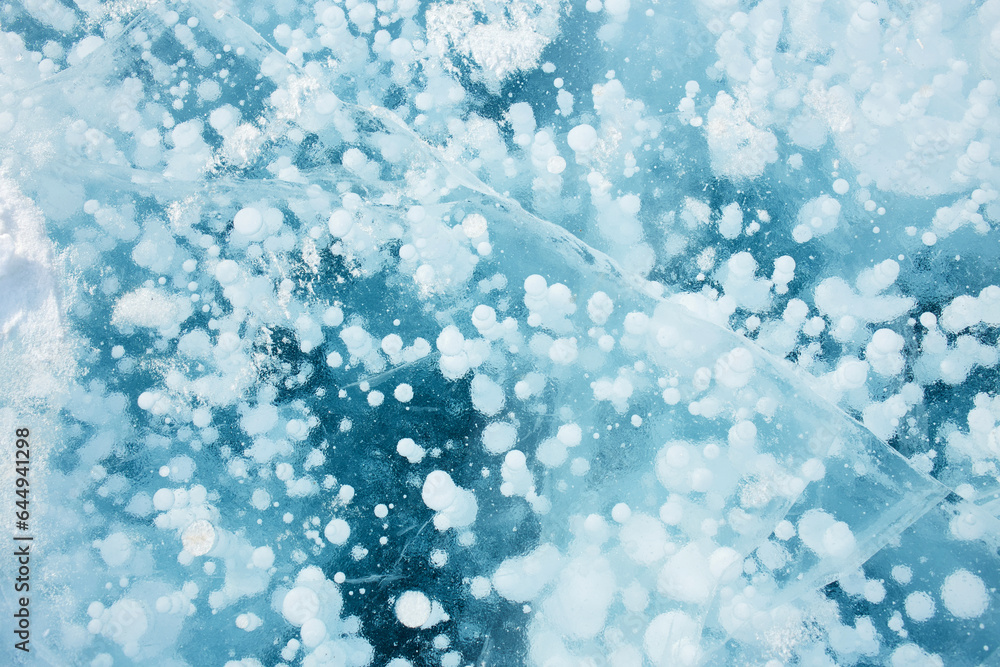 Baikal ice, pure blue ice with methane bubbles. Natural ice background ...