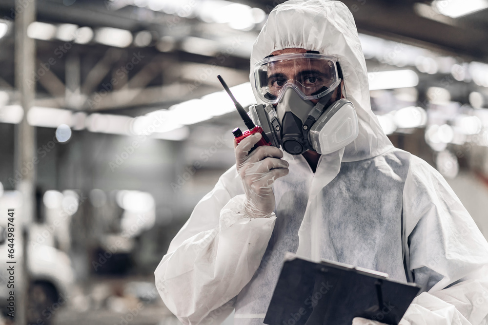 Scientist wear Chemical protection suit check danger chemical, working ...