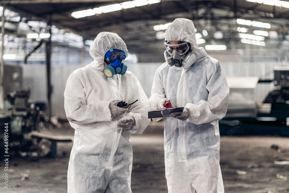 Scientist wear Chemical protection suit check danger chemical, working ...