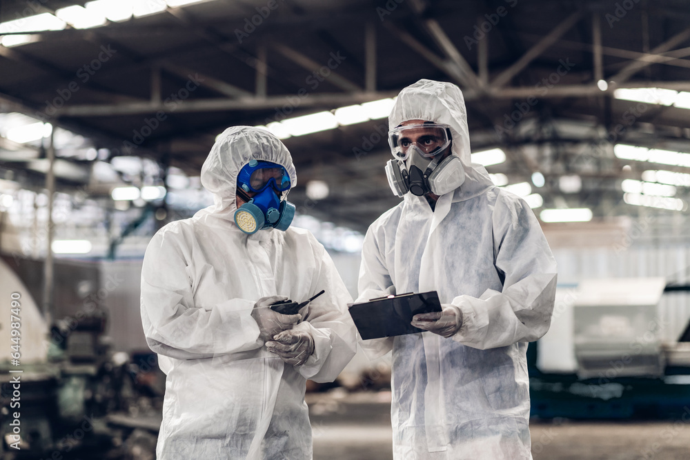 Scientist wear Chemical protection suit check danger chemical, working ...