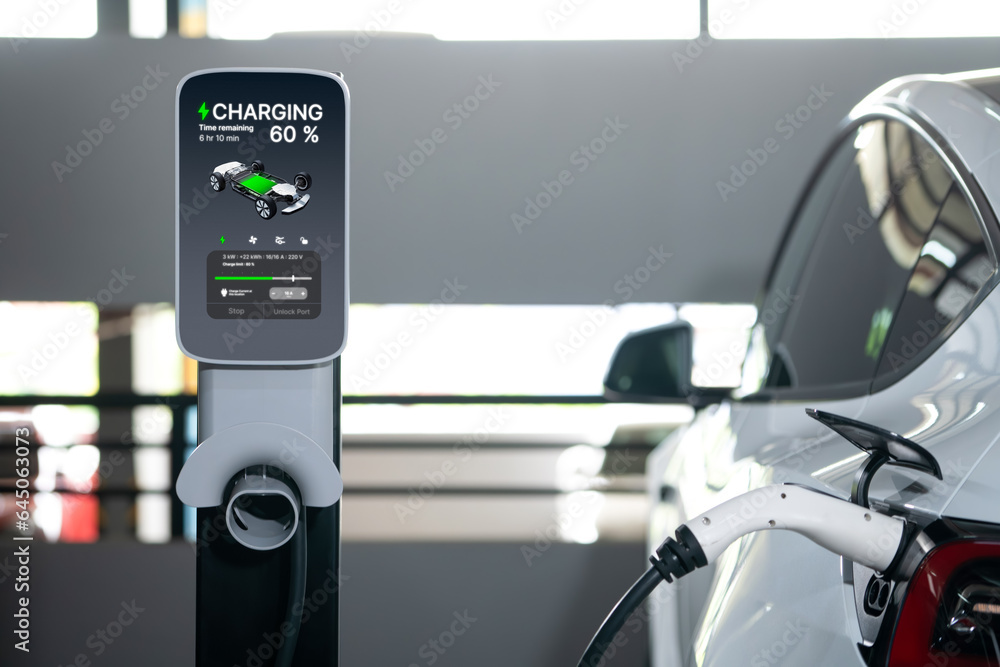 EV electric car recharge at shopping center parking lot charging in ...