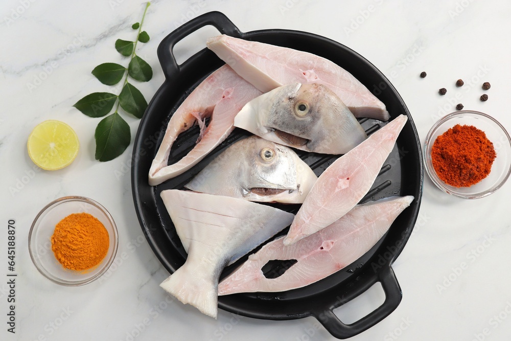 Fresh whole Silver Pomfret fish or butter fish or Poplet cut into ...