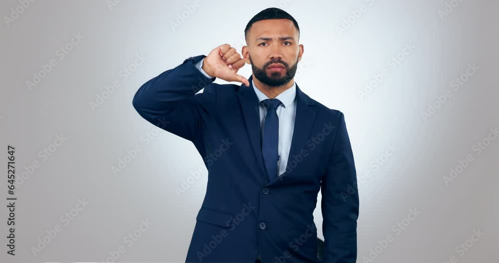 Thumbs down, dislike and face of business man in studio for rejection ...