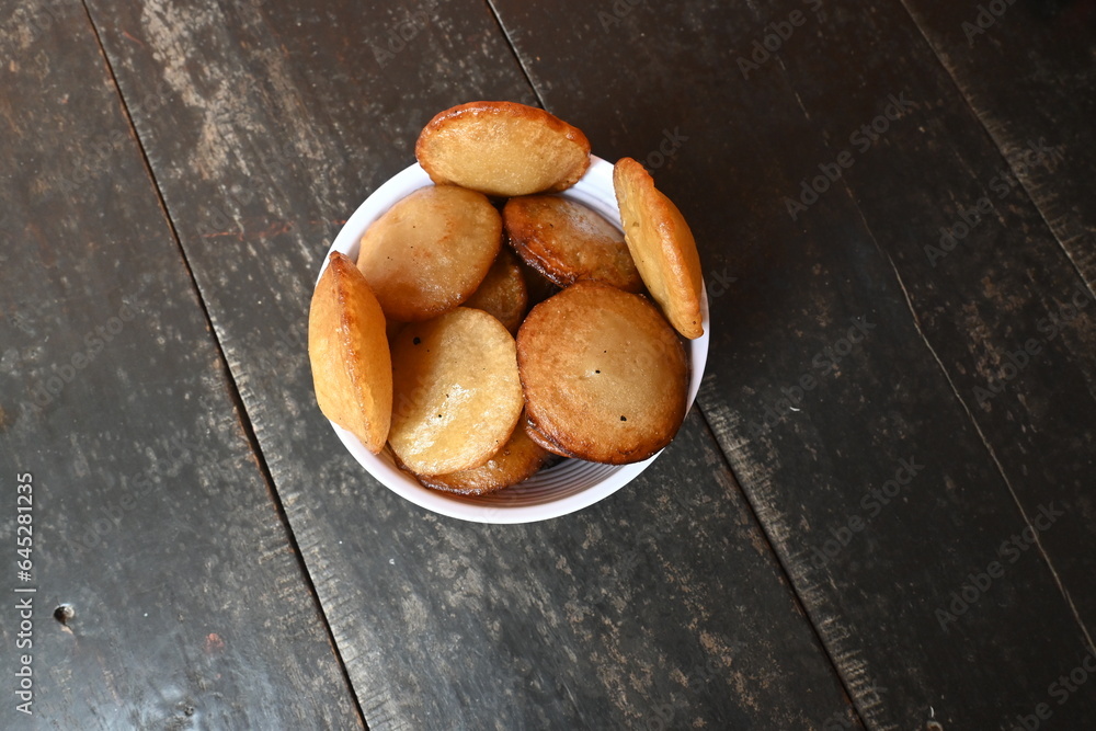 Traditional snacks and sweets of India. It is made by mixing rice flour ...