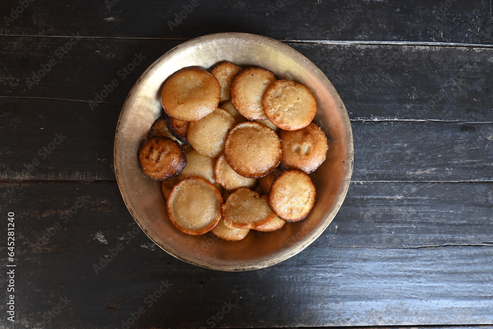 Traditional snacks and sweets of India. It is made by mixing rice flour ...