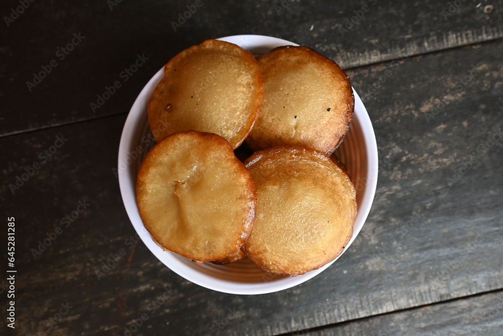 Traditional snacks and sweets of India. It is made by mixing rice flour ...