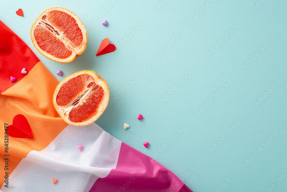 An overhead shot of a Lesbian Pride flag, its rippling design ...