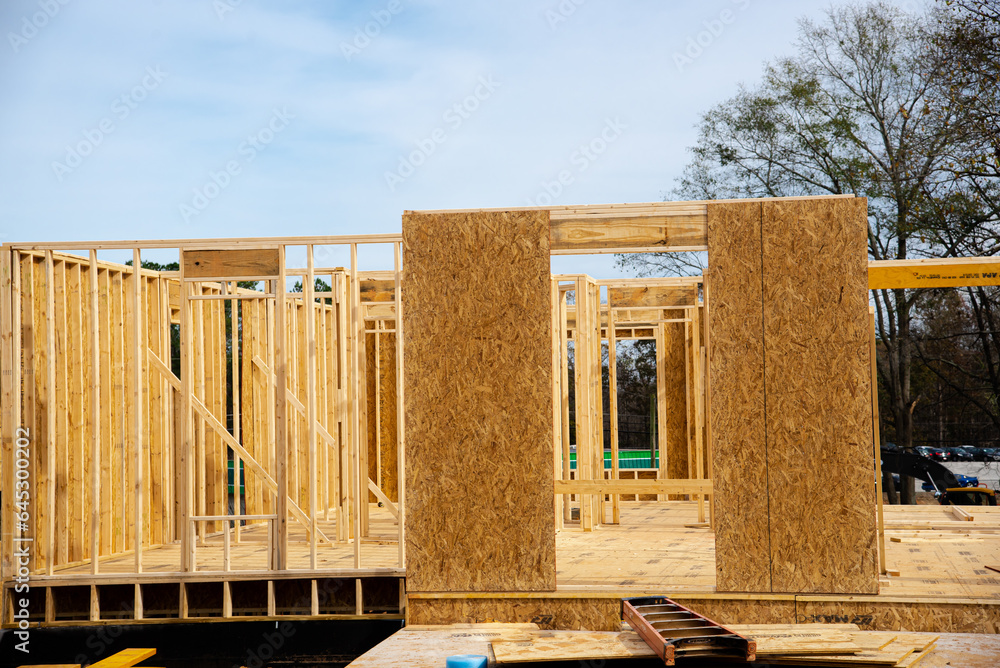 Timber frame house wooden beams with OSB (Oriented Strand Board ...