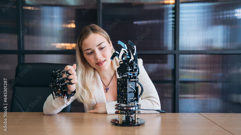 College Young students research inventions robotics and robot arm ...