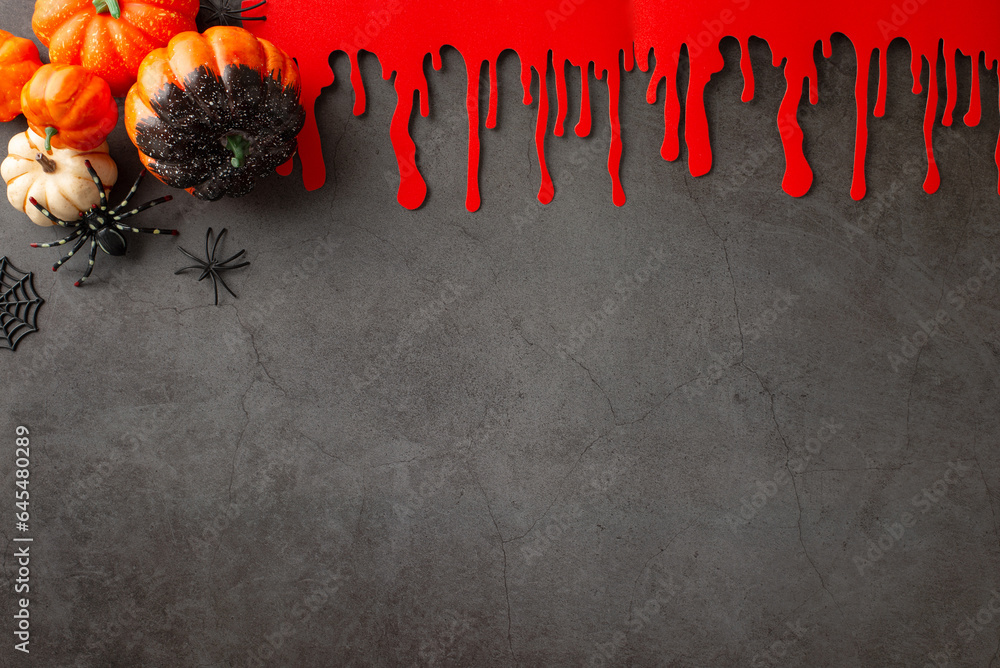 Set up spine-chilling vibes. Overhead view of Halloween elements ...