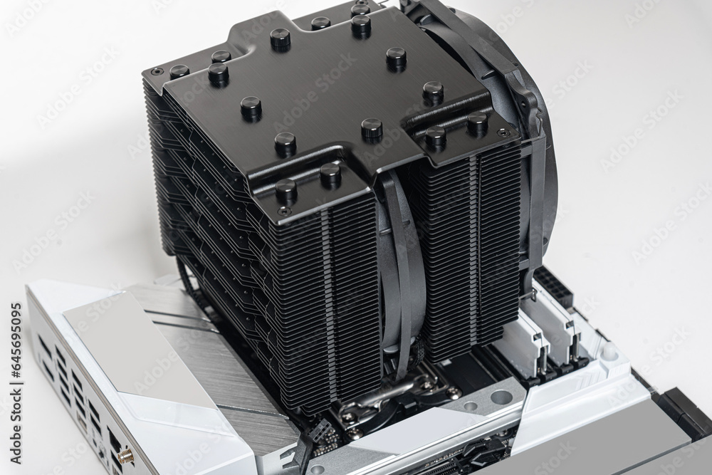 Installing a large air cooler on a computer processor. Stock Photo ...