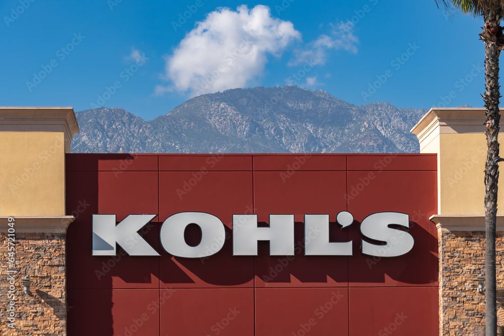 Kohl's Department Store Sign in full sunlight. In the distance above ...