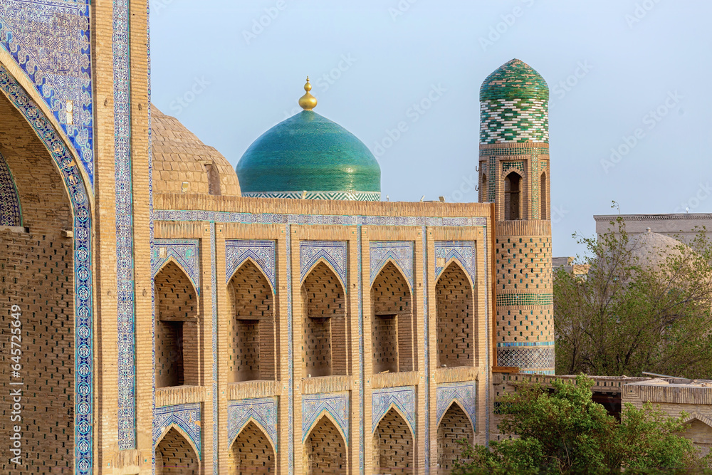 Muhammad Rakhim Khan medrese and the dome of Pahlavan-Mahmud mausoleum ...