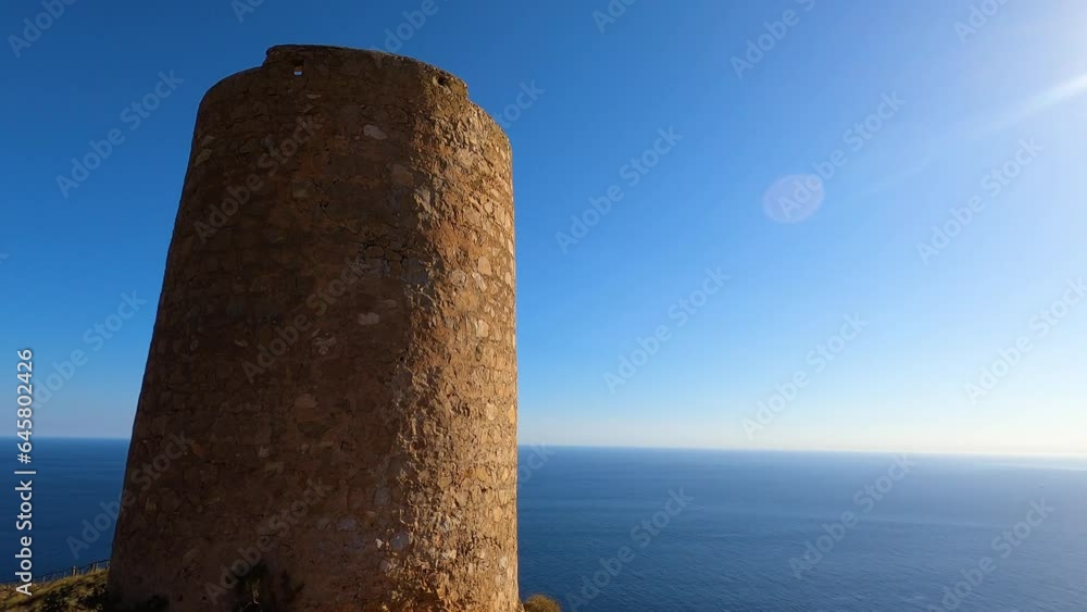 Mediterranean coastal landscape. Historic Torre Vigia De Cerro Gordo, a ...