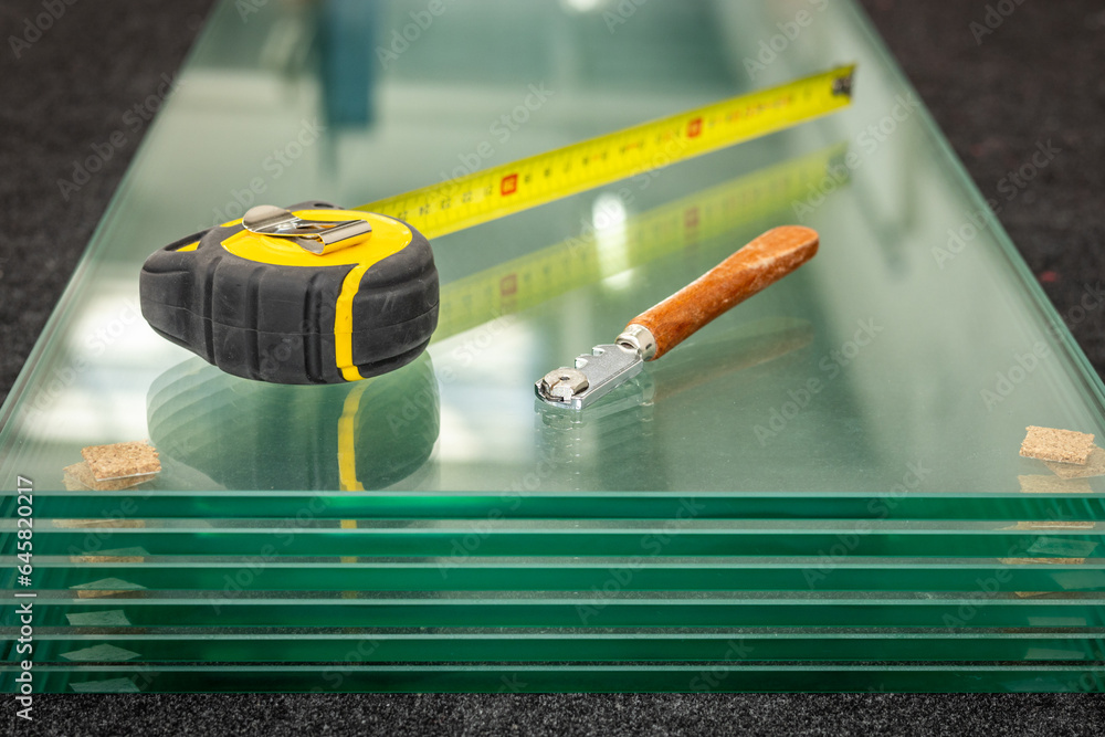glass shelves, Ground thick glass lying on the glass table, ready to be ...