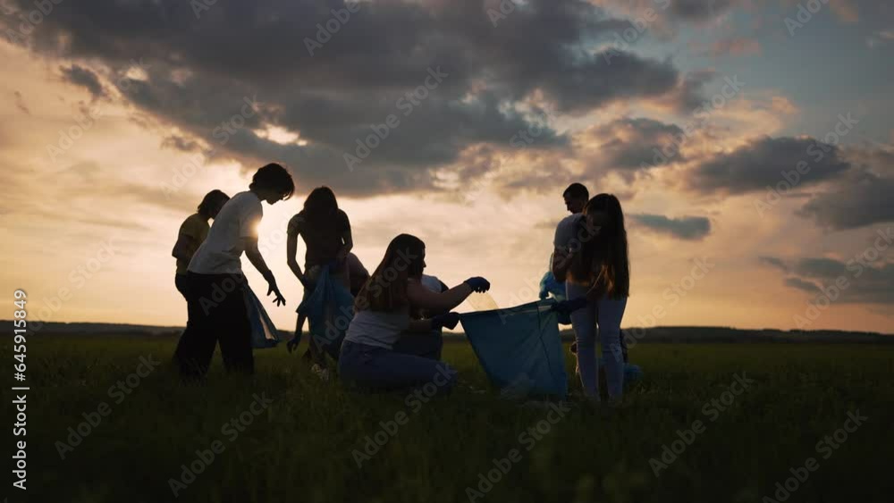Teamwork.group of people volunteers clean up plastic garbage in nature ...