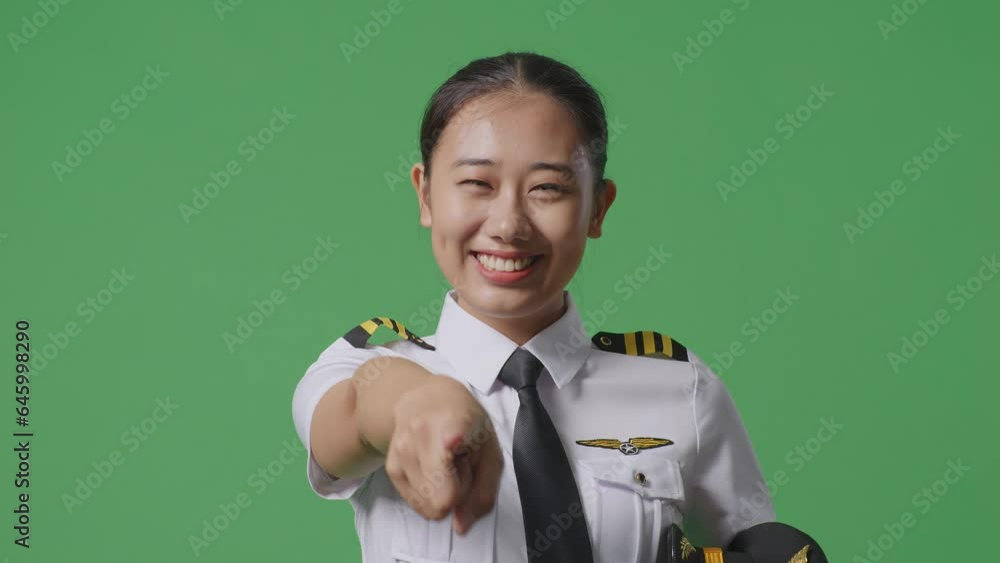 Vidéo Stock Close Up Of Asian Woman Pilot Smiling And Touching Her ...