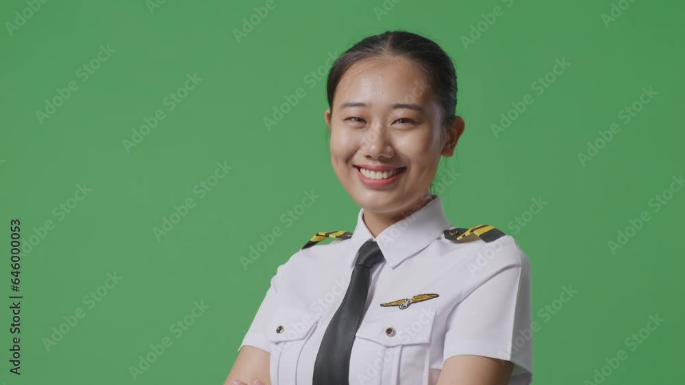 Close Up Of Side View Asian Woman Pilot Smiling And Crossing Her Arms ...