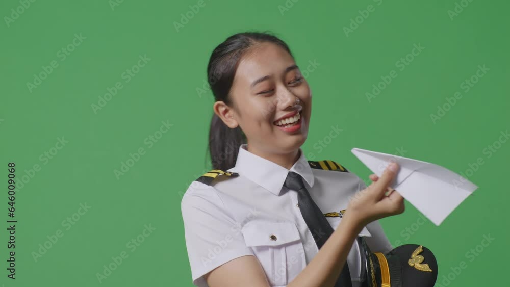 Close Up Of Asian Woman Pilot In Professional Uniform Launching Paper ...