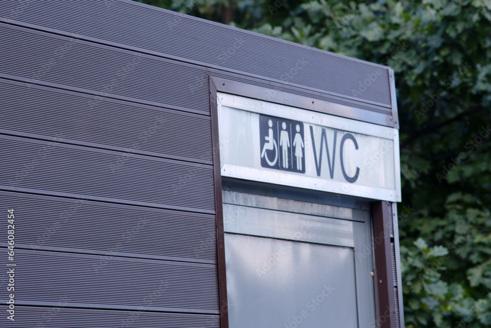 Wc sign on a public toilet in the park. Wc is a public toilet. Stock ...