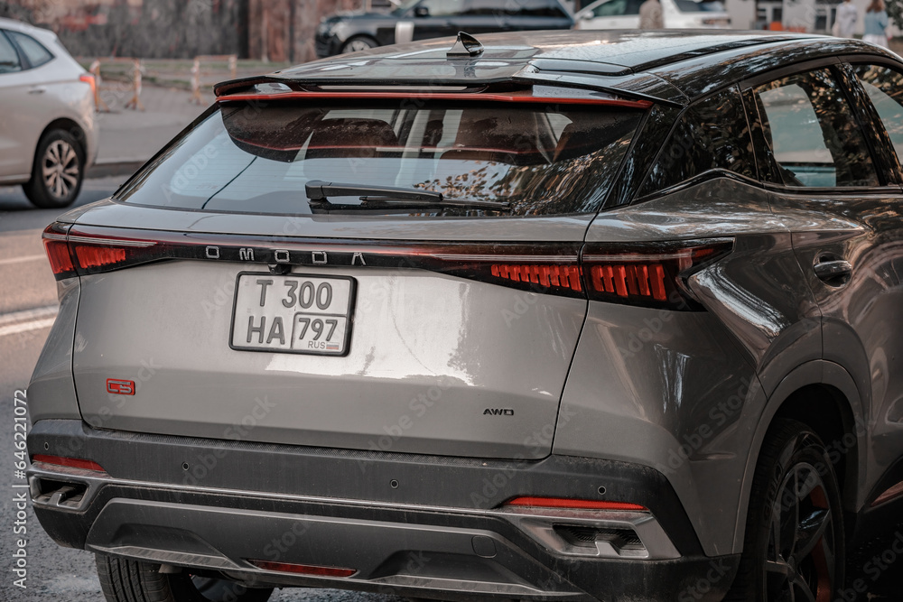 Gray Omoda C5 parked on the street in Moscow. Chinese SUV car outdoors ...