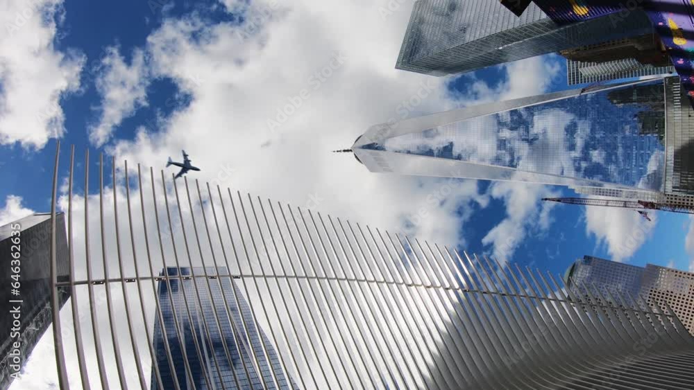 Plane flying above One World Trade Center skyscraper and Oculus in New ...