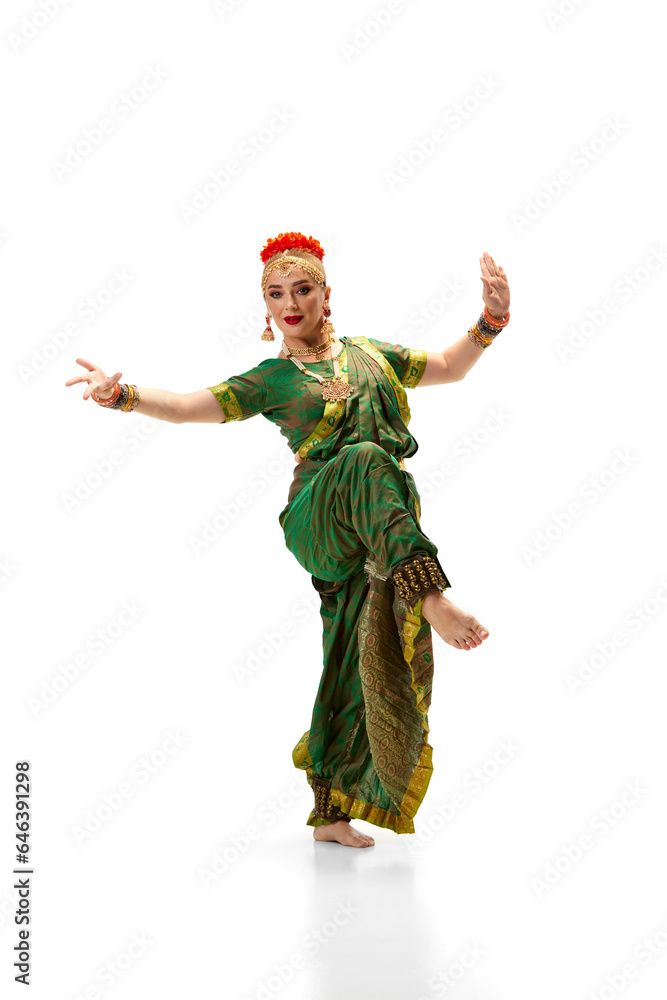 Artistic dancer, woman in traditional indian dress dancing against ...