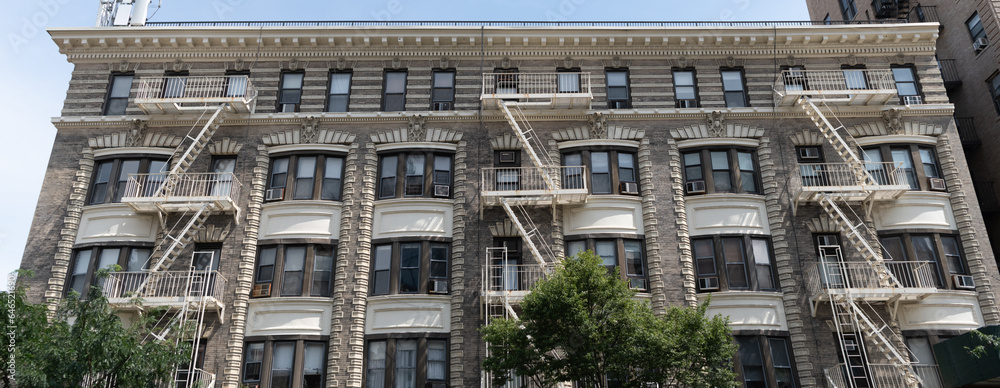 residential building architecture with emergency ladder staircase on ...