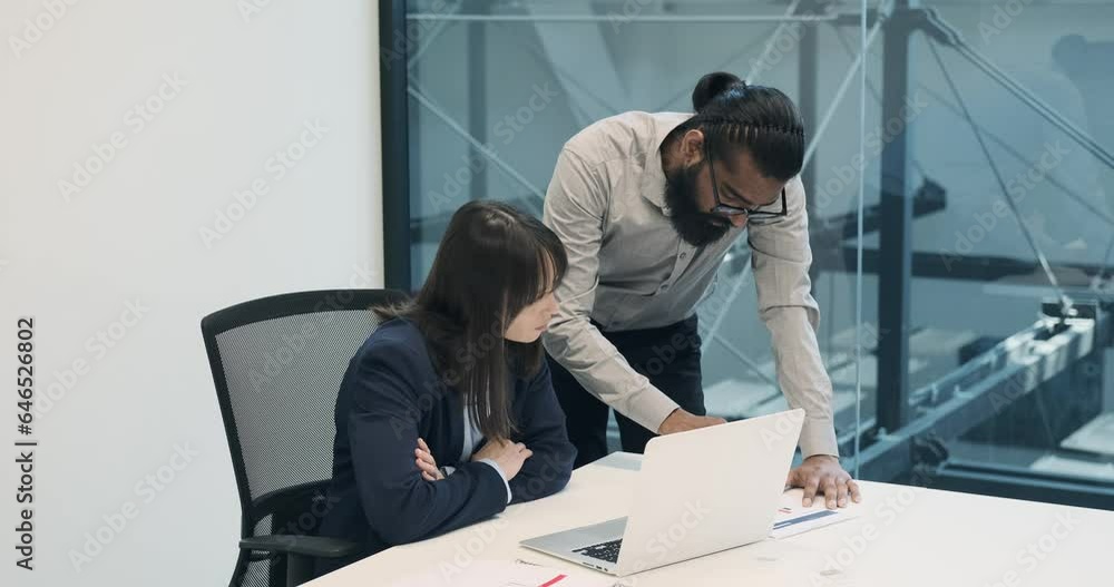 Dynamic duo of entrepreneurs collaborating on work tasks within a ...