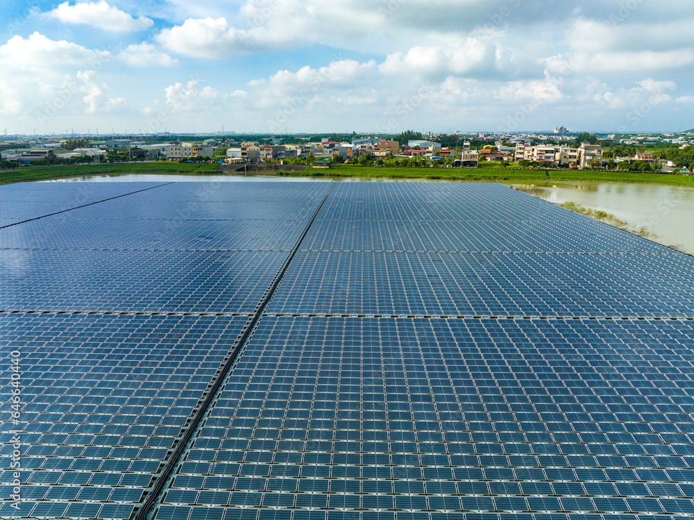 Solar panels floating in a lake seen from a drone perspective,View of ...