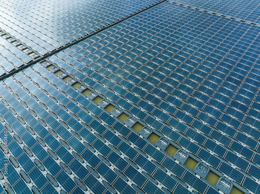 Solar panels floating in a lake seen from a drone perspective,View of ...