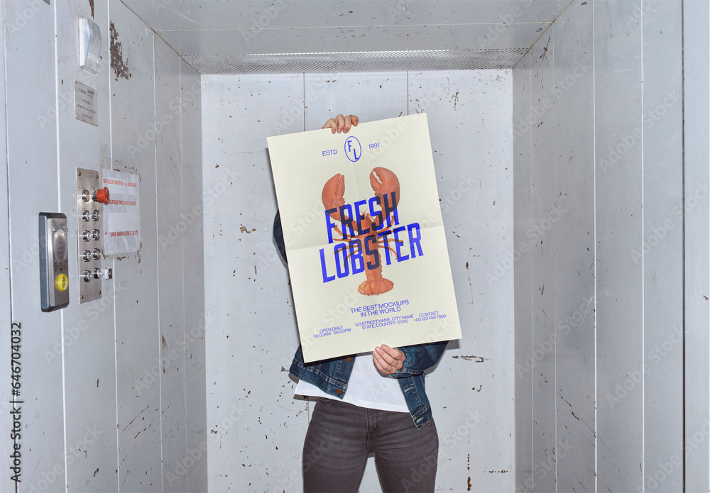 Mockup of woman holding customizable A2 vertical poster in front of ...