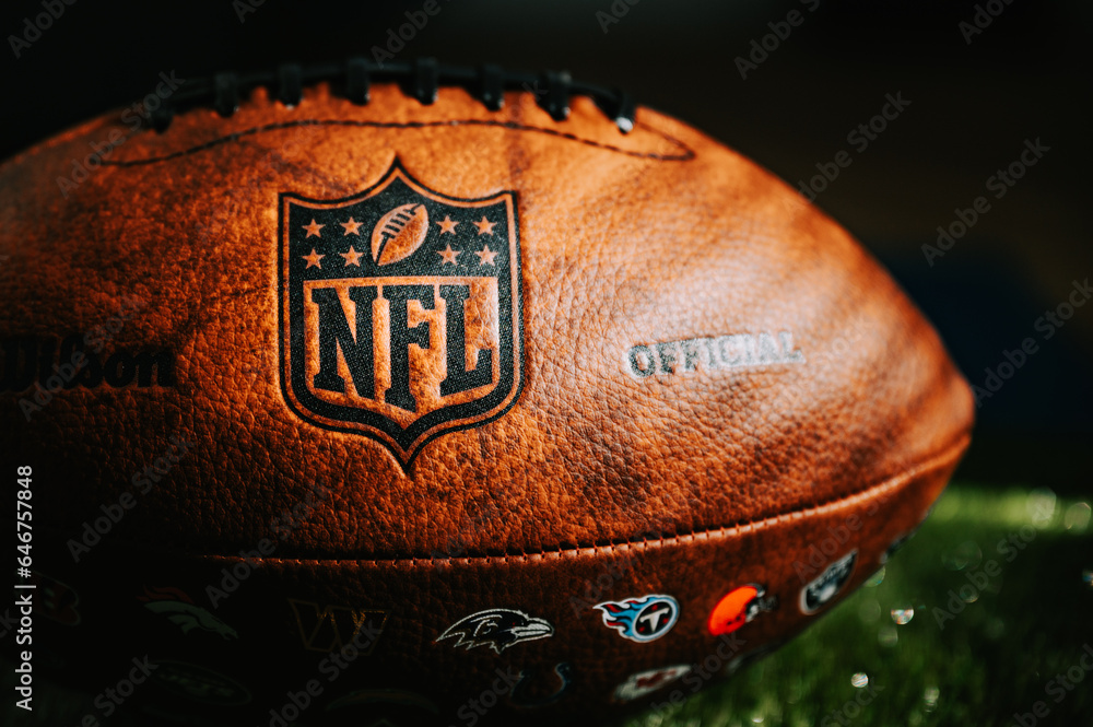 NEW YORK, USA, SEPTEMBER 11, 2023: NFL Leather Ball and Emblem in Focus ...