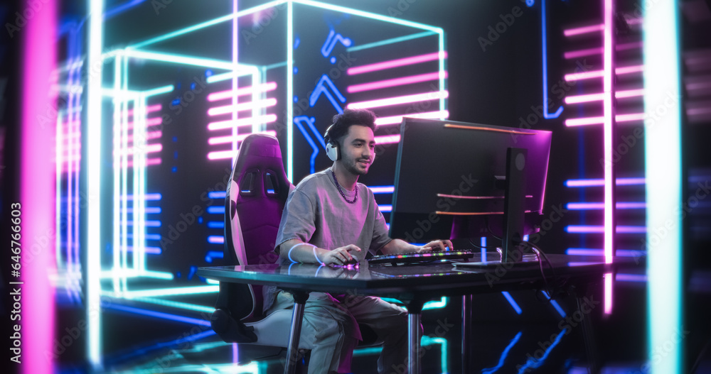 Young Man Wearing Casual Comfortable Clothes and a Chain, Playing Video ...
