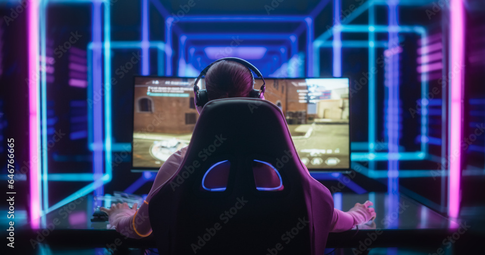 Young Female Professional Gamer Competing in an E-Sports Championship ...