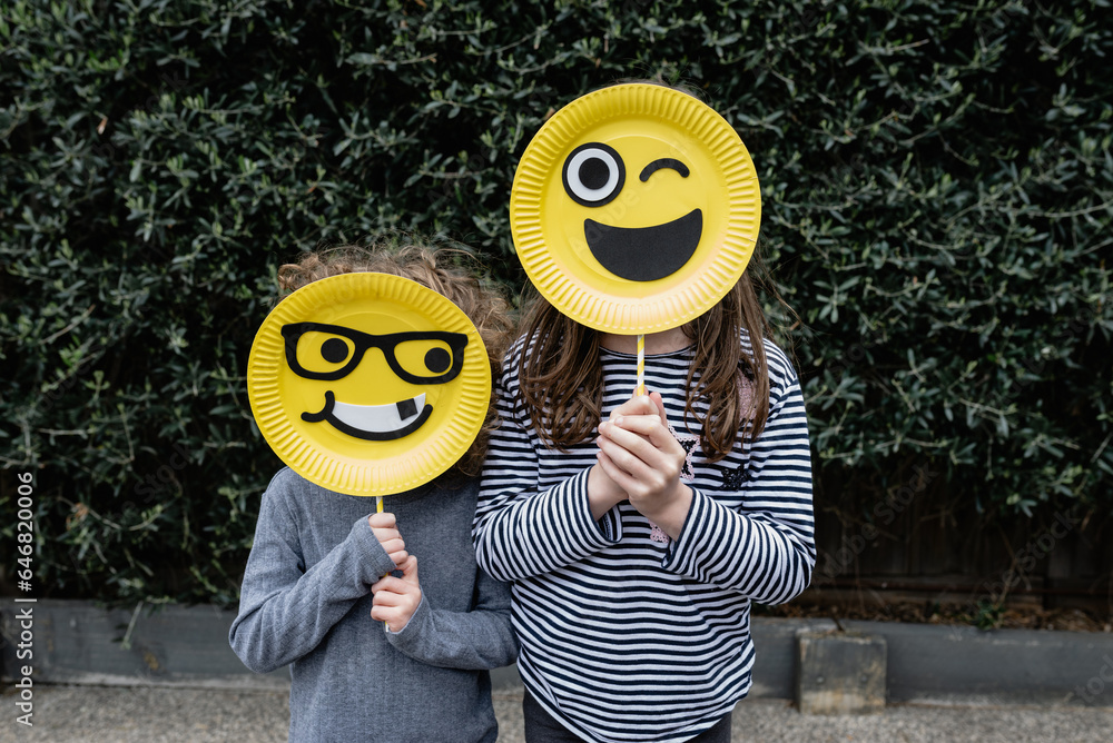 Anonymous children holding handmade happy emoji / emoticon masks Stock ...