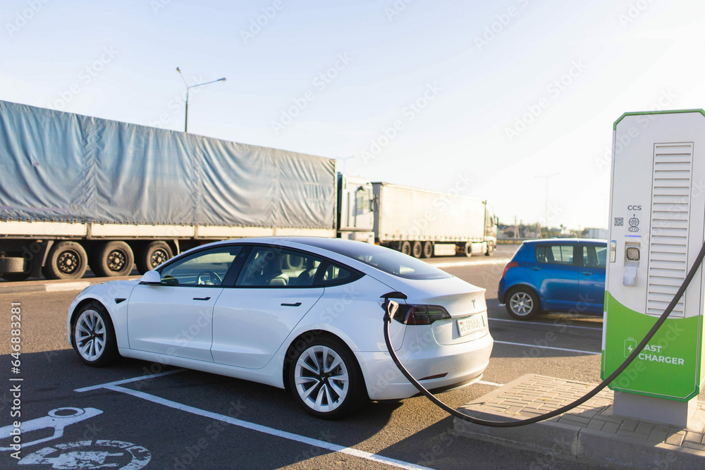 Minsk, Belarus. September 2023 Tesla Model S, EV charging. . Charging a ...