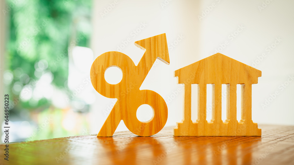 Bank symbol and Percentage model on wood table. Concepts of the banking ...