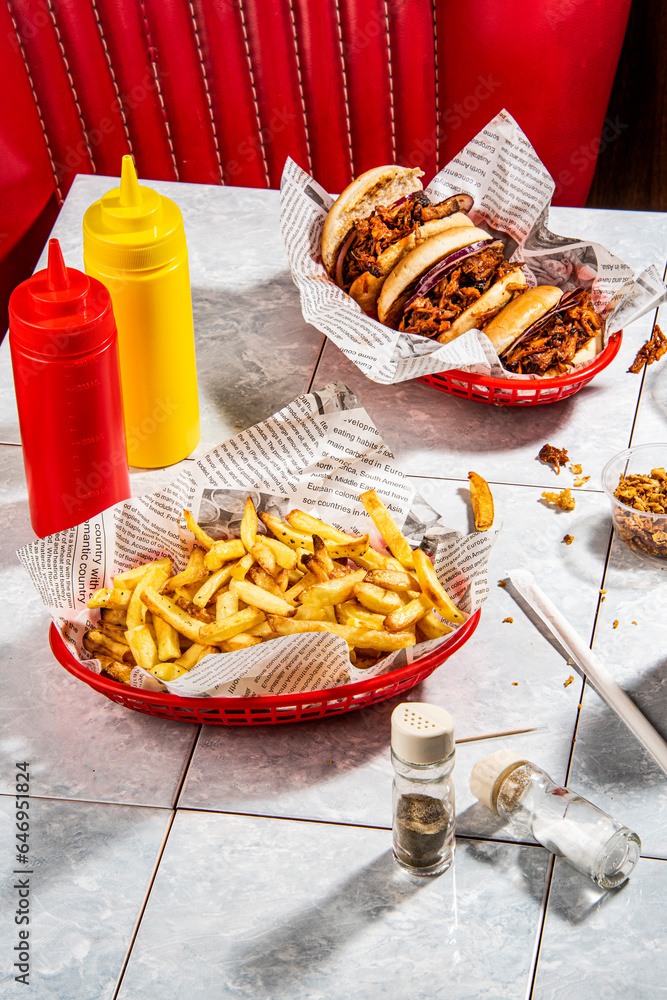 American buns with torn meat, vegetable and pomme frites in the fast ...